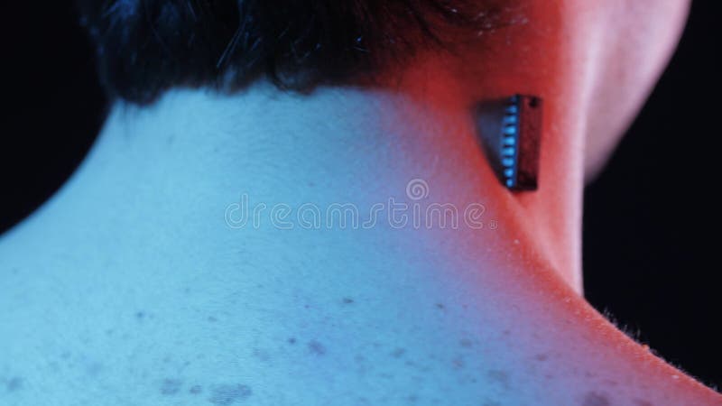 Chipization of People. Man with Chip Behind Ear Stock Footage - Video ...