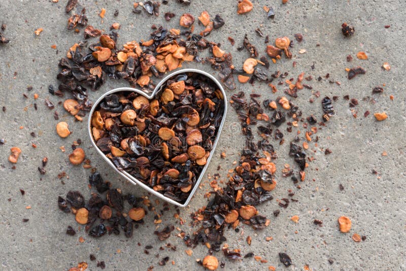 Chipotle Pepper Flakes in a Heart Shape Stock Image - Image of ...