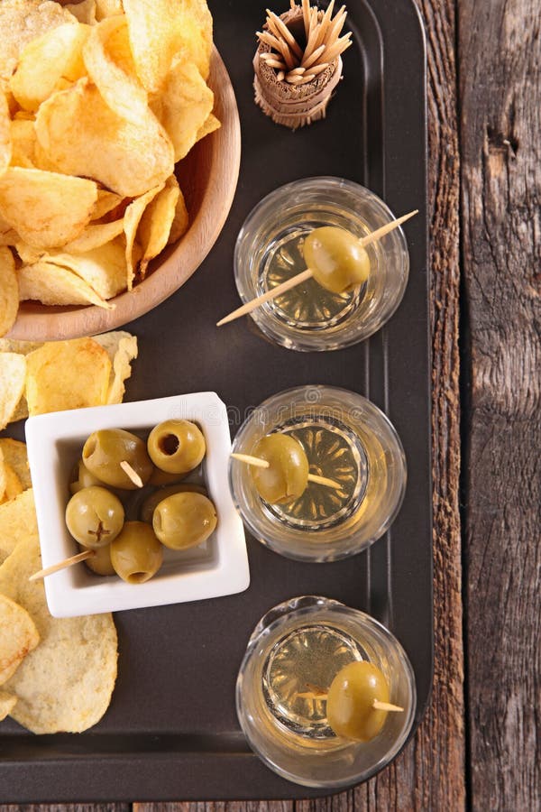 Chips, alcohol and olive stock image. Image of casino - 178404357