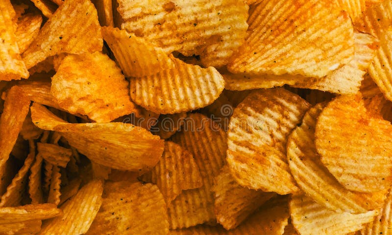 Chips Background. Spicy Paprika Flavour Chips Theme. Wavy Crisps Stock ...