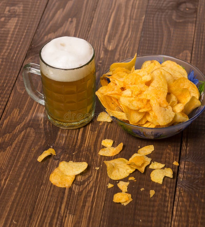 Chips and beer stock image. Image of glass, refreshment - 67747495