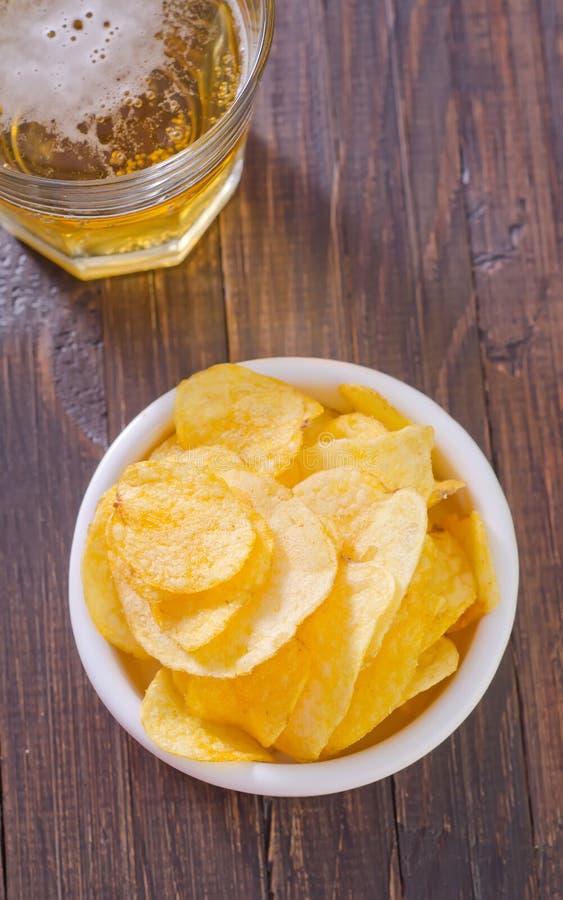 Chips and beer stock photo. Image of foam, cool, pint - 34228374