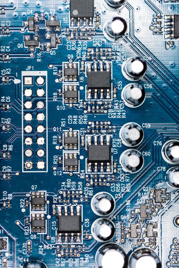 Chips on a blue PCB stock image. Image of industrial - 45906307