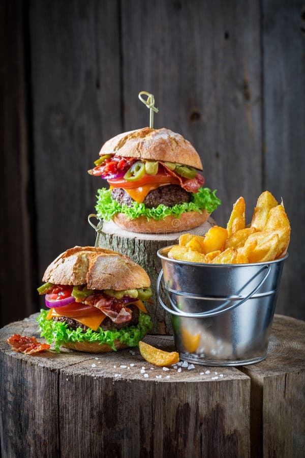 Chips and Burger with Lettuce, Beef and Cheese Stock Image - Image of ...