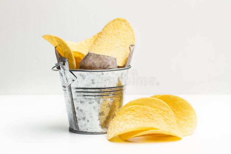 Chips in a galvanized cube stock photo. Image of pringles - 135993916