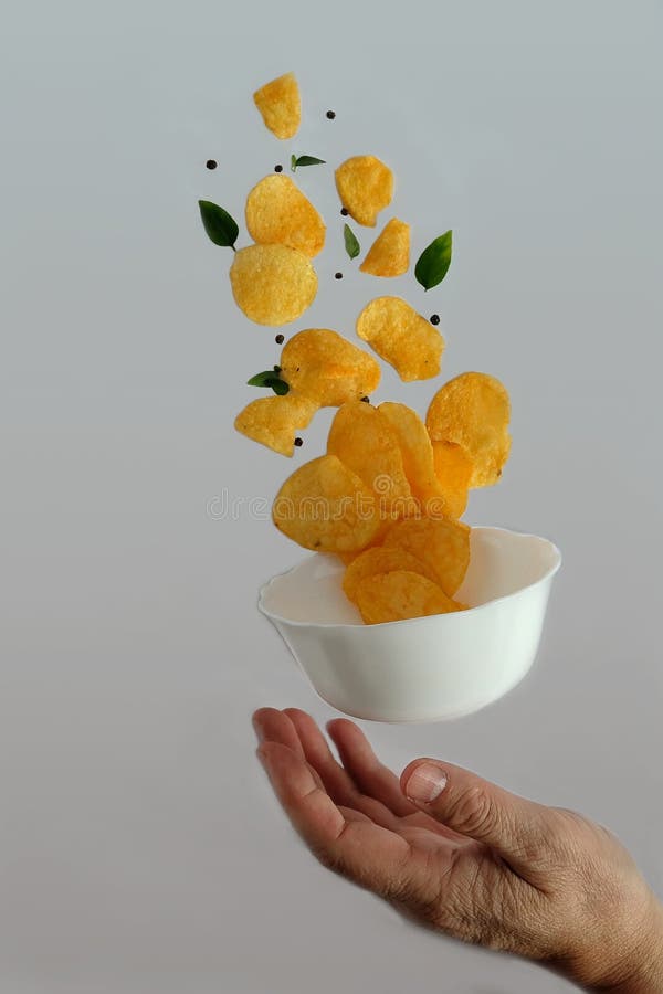 The Chips in the Plate are Thrown Up and are in Flight. Stock Photo ...