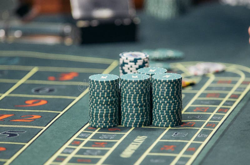 The Chips on the Playing Field Stock Photo - Image of green, roulette ...