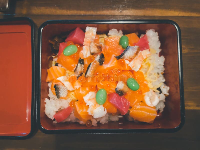 Chirashi Sushi with Mixed Raw Fish and Salmon Roe Over Rice in Box ...