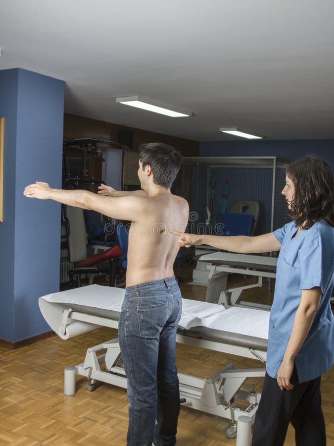 Chiropractor Doing a Visual Exploring, Static, Dynamic Position ...