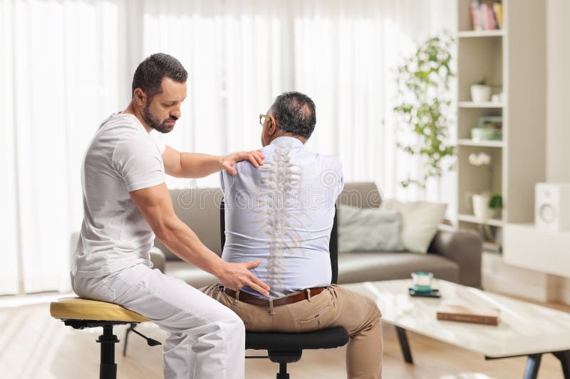 Chiropractor Treating Man Spine Problem Stock Photos - Free & Royalty ...