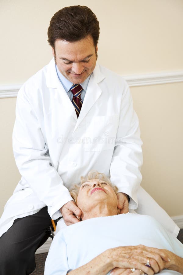 Handsome Chiropractor Working Stock Image - Image of examination ...