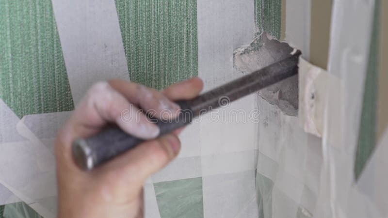A Chisel and a Hammer are Used To Lay the Route of the Pipe and Wires ...
