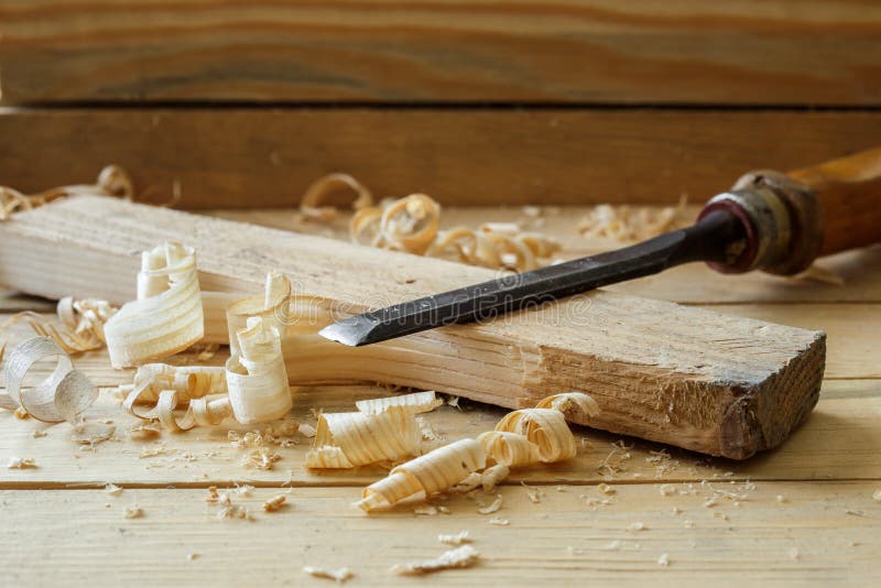 Chisel and wood chips stock image. Image of equipment - 122014621