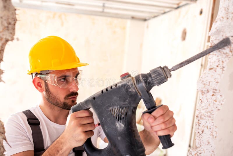 Chiseling of a Concrete Wall Stock Image - Image of glasses, happy ...