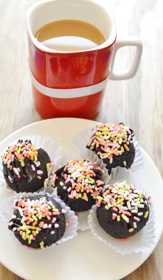 Chocolate Ball Topping Colorful Candy and Red Coffee Cup Stock Image ...