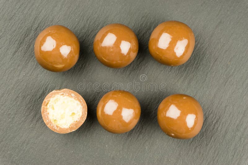 Chocolate Balls on a Black Background Stock Photo - Image of crunch ...