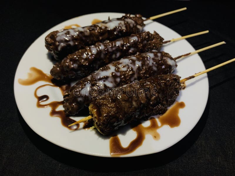 Chocolate Banana Satay with Sweet Chocolate Milk Coating Stock Image ...