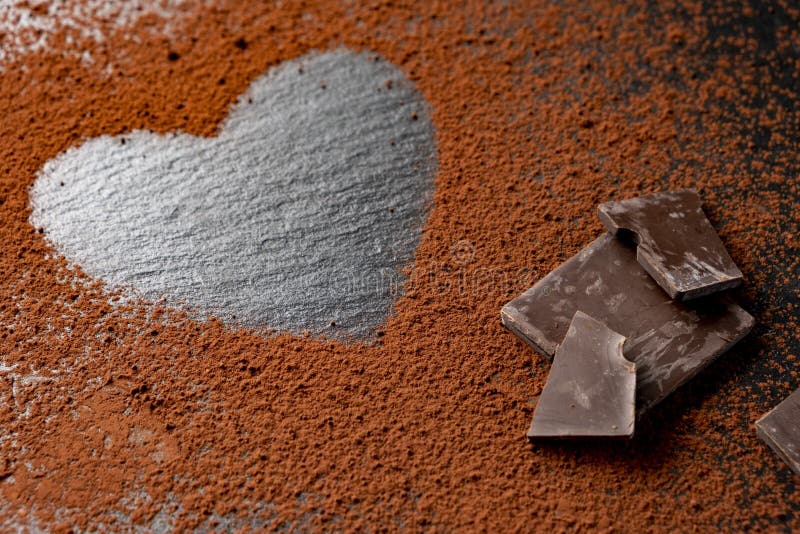 Chocolate Bar on a Black Background, Cocoa Powder Painted Heart. Stock ...