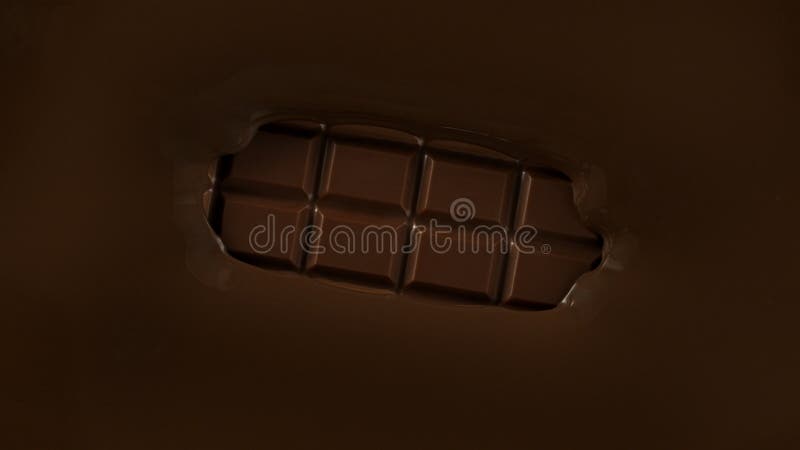 Chocolate Bar in Dark Hot Melted Chocolate Stock Photo - Image of ...