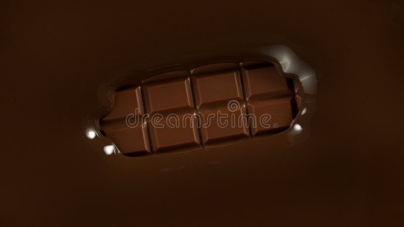 Chocolate Bar in Dark Hot Melted Chocolate Stock Image - Image of ...