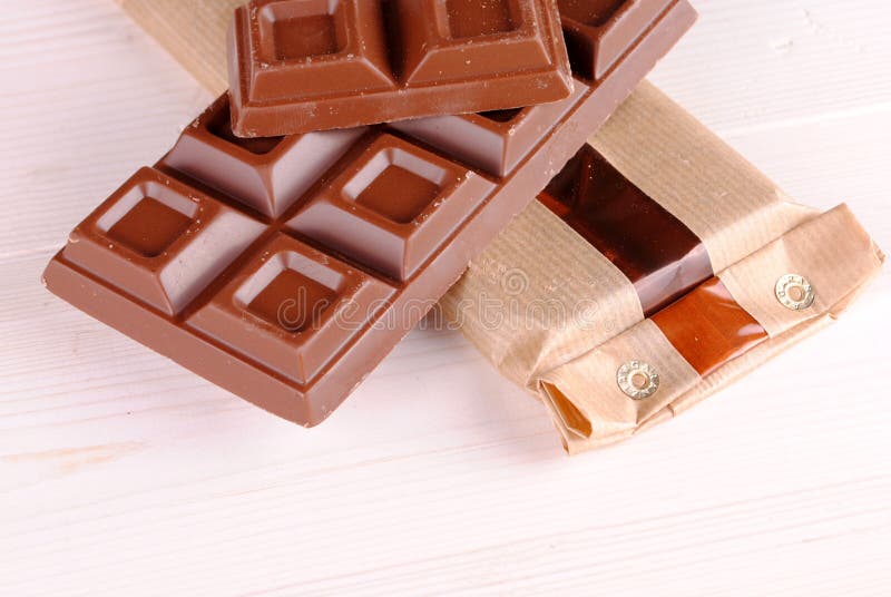 Chocolate bar and a packet stock photo. Image of pile - 27080134