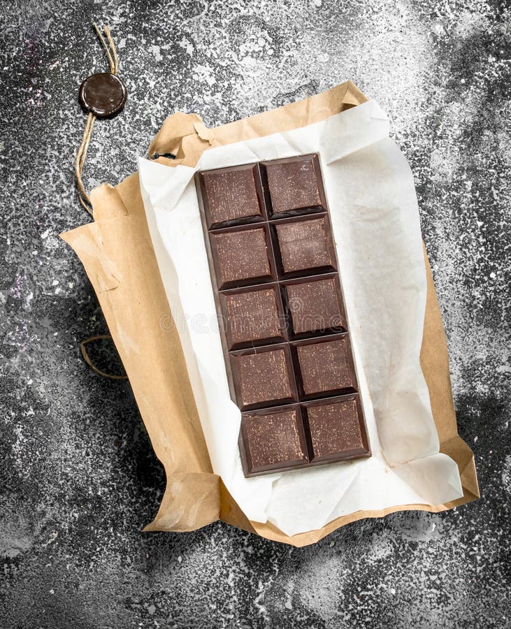 Chocolate Bar in a Paper Wrapper. Stock Photo - Image of delicious ...