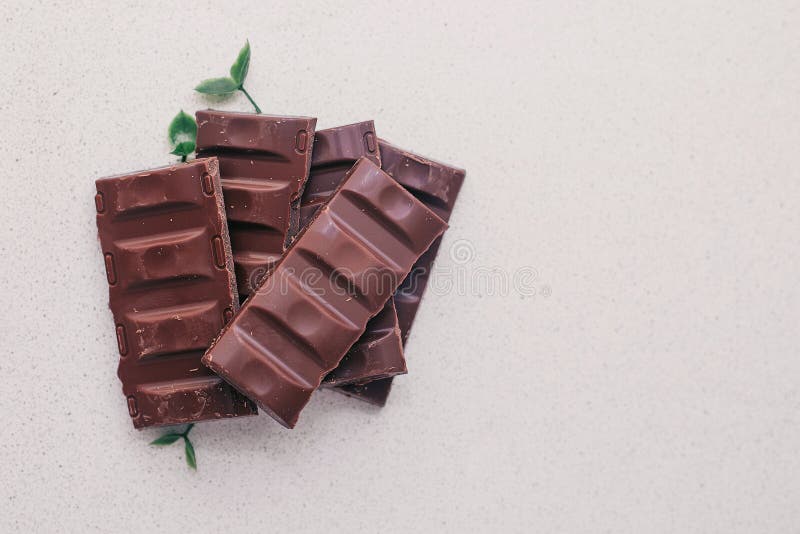 Chocolate bar on the table stock photo. Image of milk - 180780468