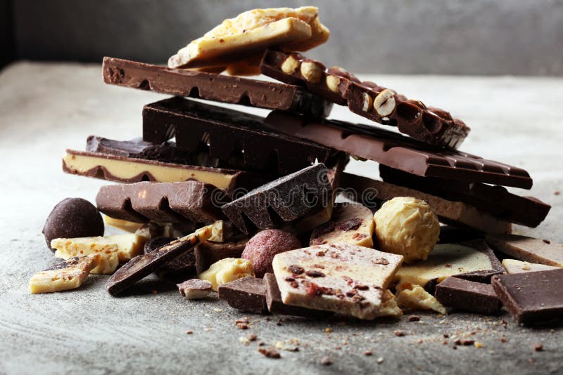 Chocolate Bars on Table with Chocolate Tower. Stock Photo - Image of ...