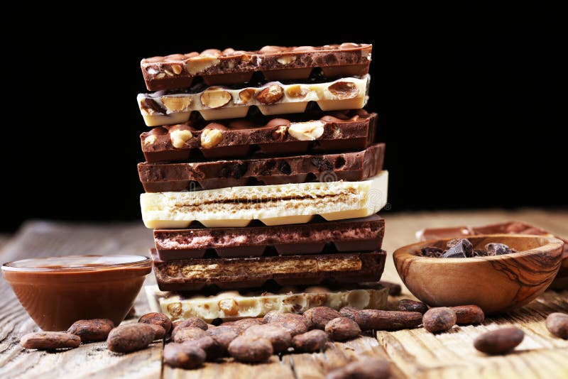 Chocolate Bars on Table with Chocolate Tower. Stock Image - Image of ...