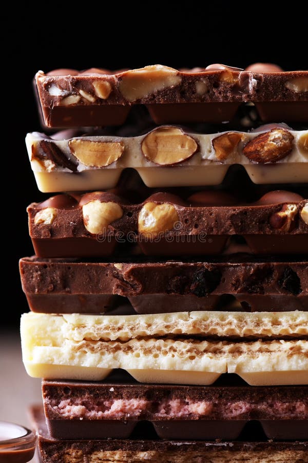 Chocolate Bars on Table with Chocolate Tower. Stock Image - Image of ...