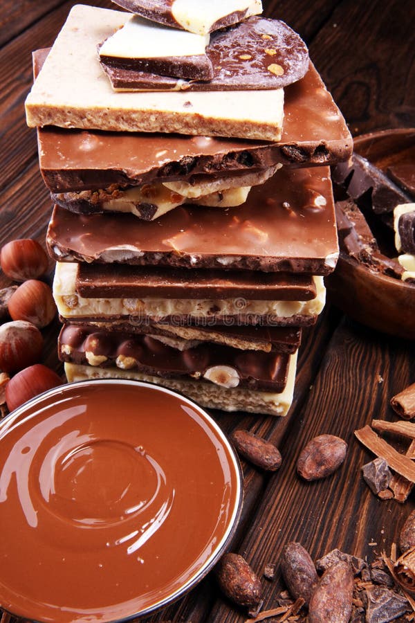Chocolate Bars on Table with Chocolate Tower Stock Photo - Image of ...