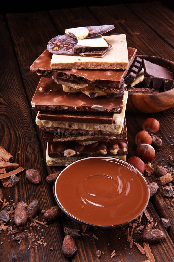 Chocolate Bars on Table with Chocolate Tower Stock Image - Image of ...