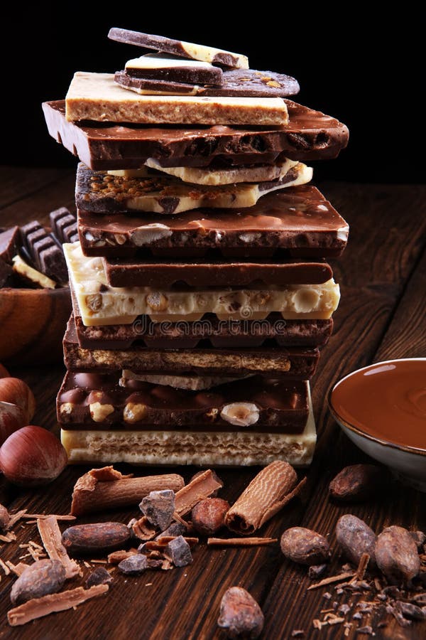 Chocolate Bars on Table with Chocolate Tower Stock Photo - Image of ...