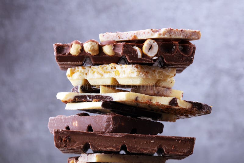 Chocolate Bars on Table with Chocolate Tower. Stock Image - Image of ...