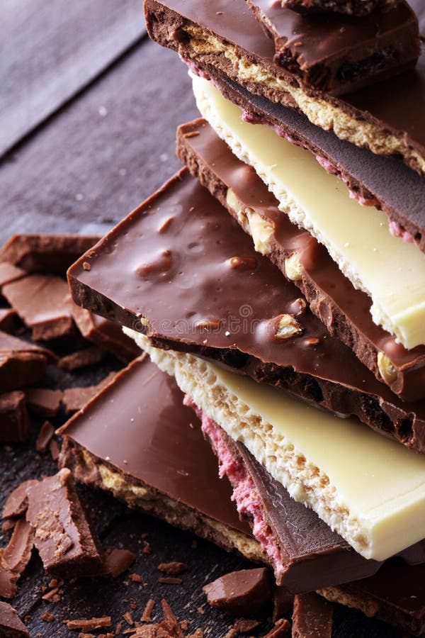 Chocolate Bars on Table with Chocolate Tower. Stock Image - Image of ...