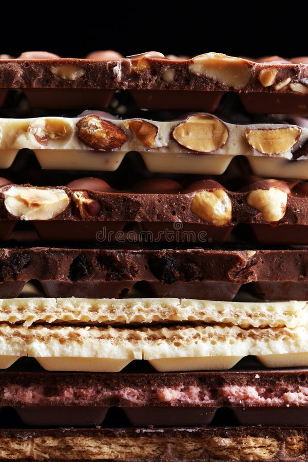 Chocolate Bars on Table with Chocolate Tower. Stock Photo - Image of ...