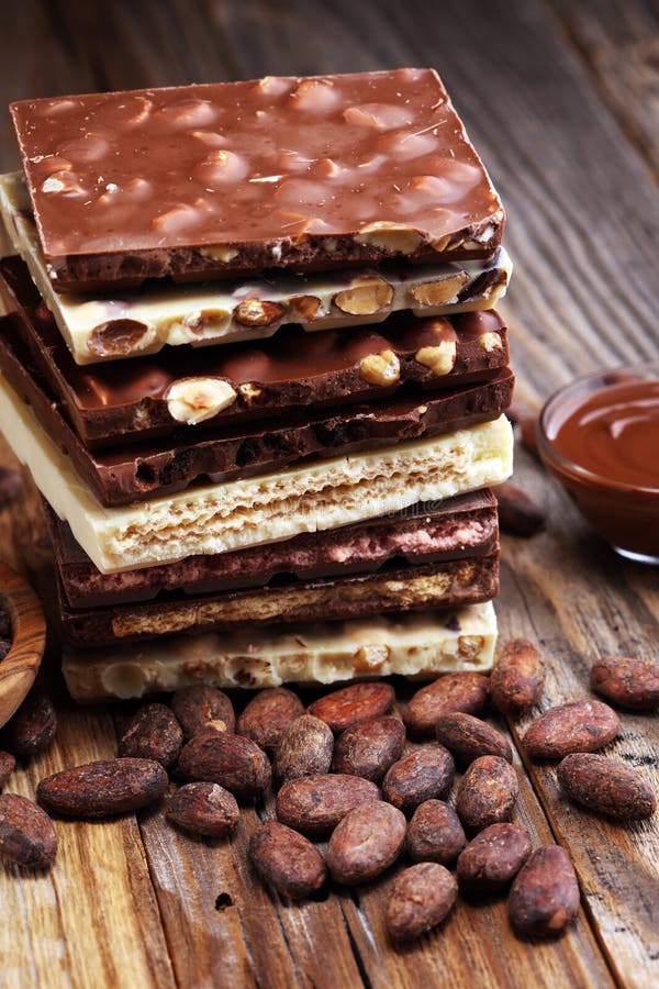 Chocolate Bars on Table with Chocolate Tower. Stock Image - Image of ...