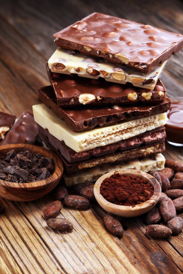Chocolate Bars on Table with Chocolate Tower Stock Photo - Image of ...