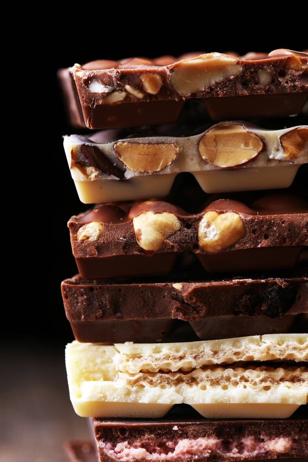 Chocolate Bars on Table with Chocolate Tower Stock Photo - Image of ...