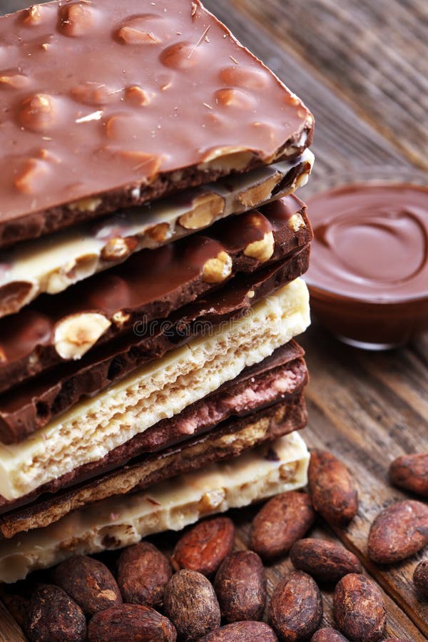 Chocolate Bars on Table with Chocolate Tower Stock Photo - Image of ...
