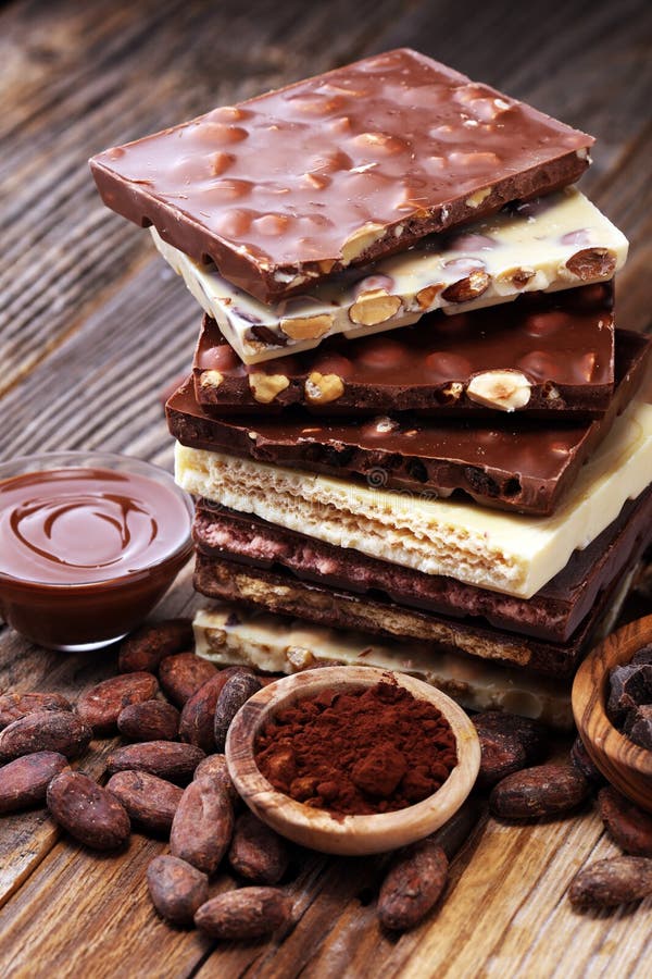 Chocolate Bars on Table with Chocolate Tower Stock Photo - Image of ...