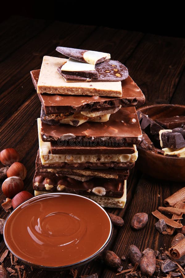 Chocolate Bars on Table with Chocolate Tower Stock Image - Image of ...