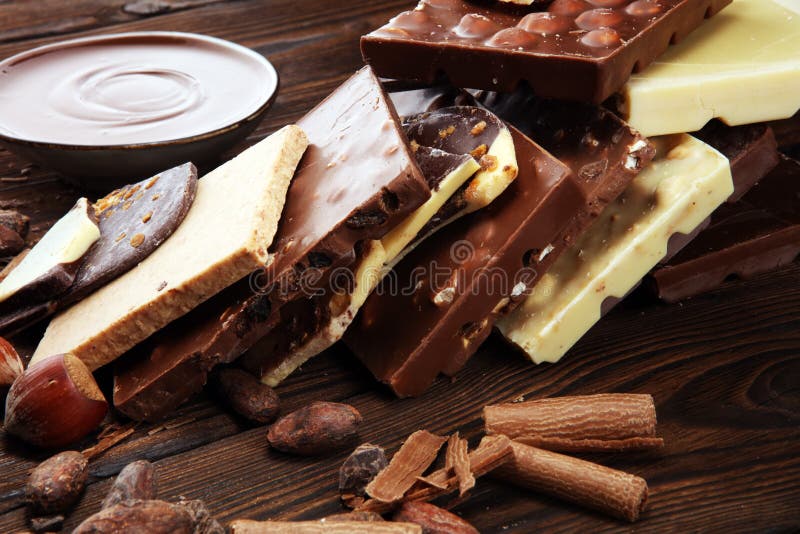 Chocolate Bars on Table with Chocolate Tower Stock Photo - Image of ...