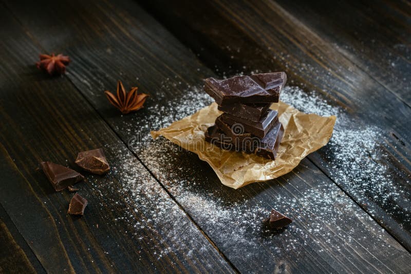 Chocolate on the Black Table. Dark Chocolate. Chocolate Chunks Stock ...
