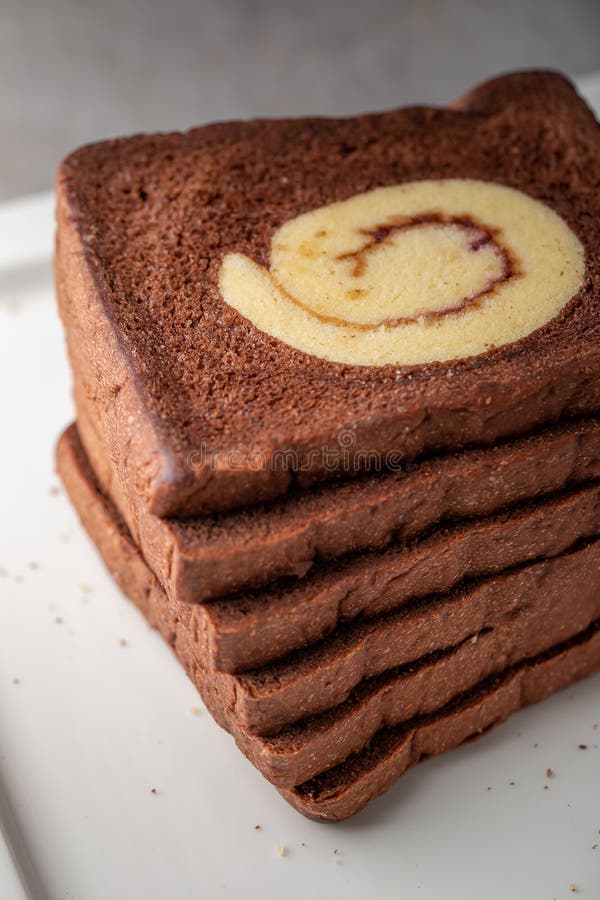 Chocolate Bread Stuffed with Jam Rolls Topped with Chocolate Sauce ...