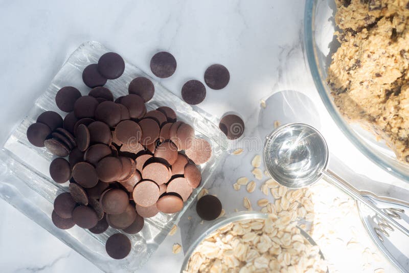 Chocolate Button in a Glass Plate on Marble Table Stock Image - Image ...