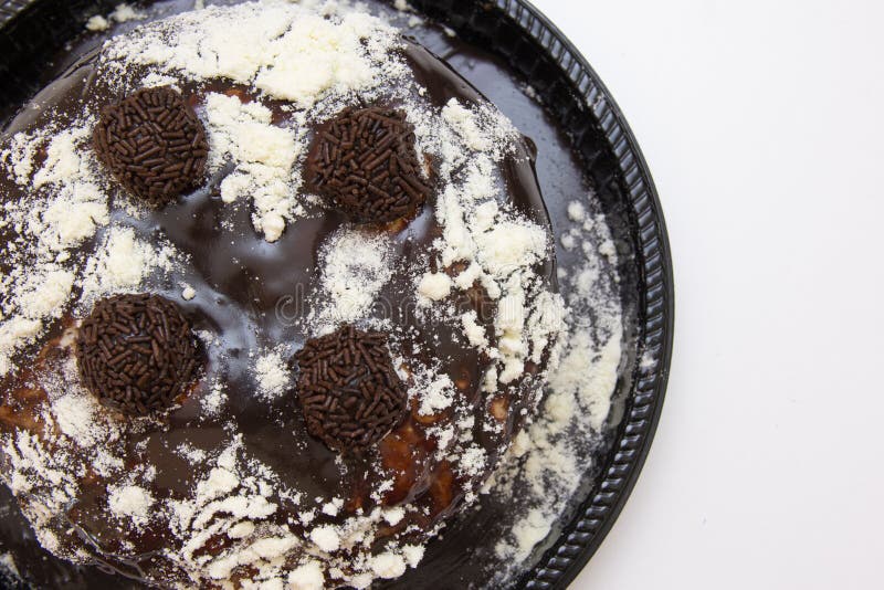 Chocolate Cake with Brigadeiro Topping and Powdered Milk Stock Photo ...