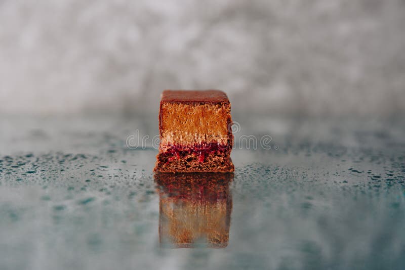 Chocolate Cake Cut on a Mirror Surface Stock Photo - Image of square ...