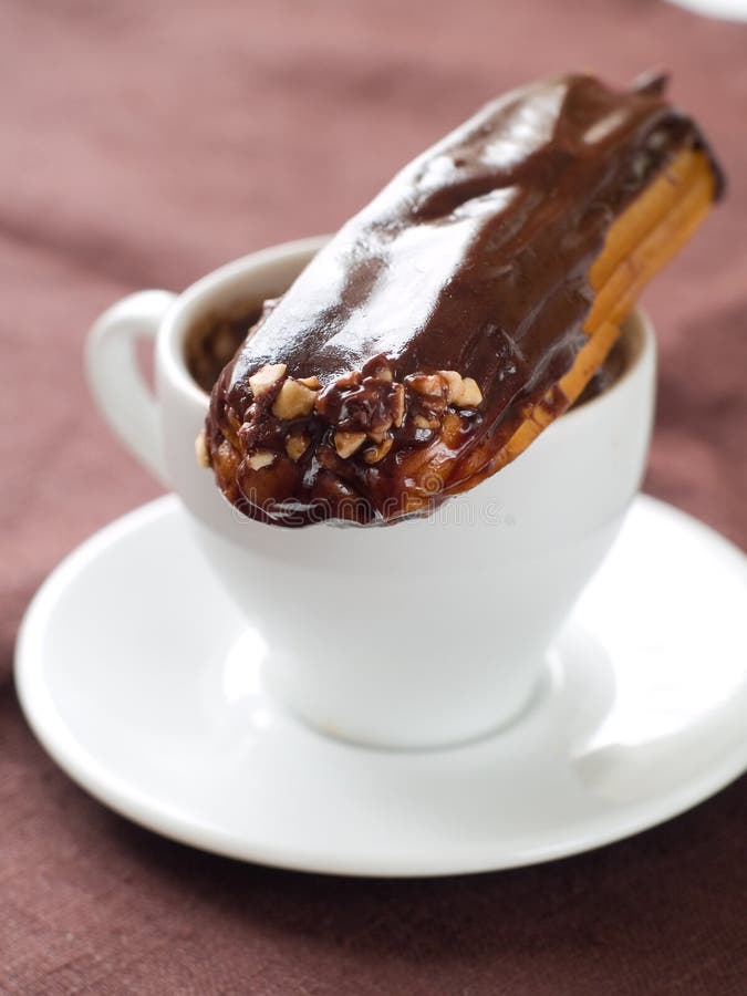 Chocolate cake (eclair) stock photo. Image of plate, cake - 29328622