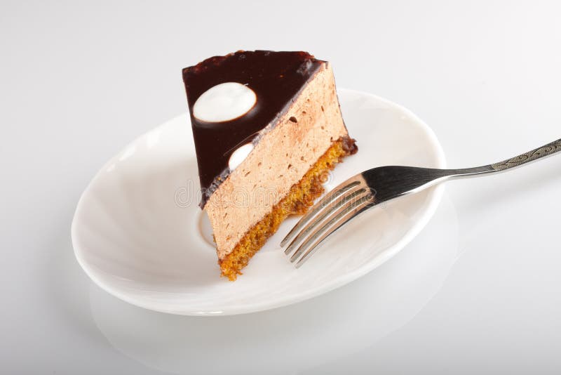 Chocolate cake with fork stock photo. Image of dark, cream - 17935946